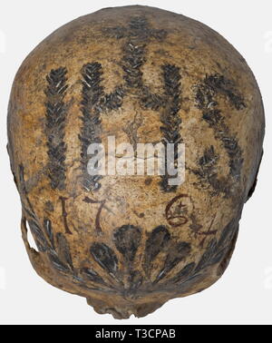 An ossuary skull, South German or Austrian, dated 1764 Female skull ...