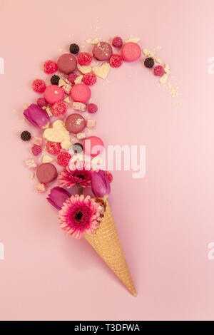 Waffle flowers on a pink background. Confectionery decor. The large ...