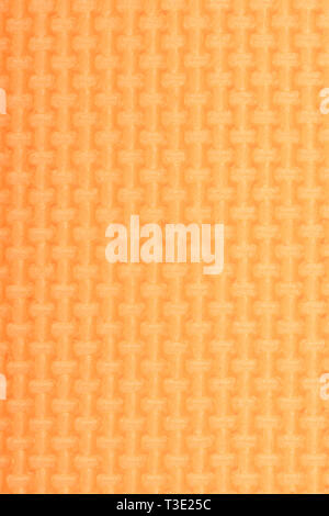 Closeup of an orange yoga mat on the grass under the sunlight Stock ...