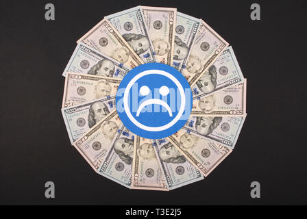 Sad smile faces on mandala kaleidoscope from money. Abstract money ...