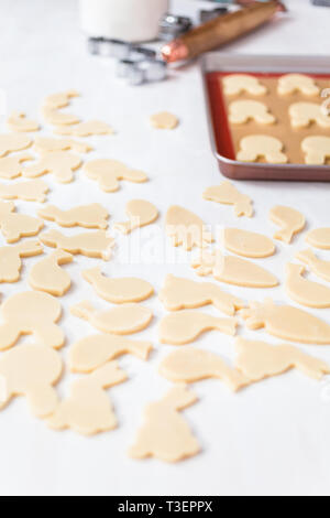 Unbaked Easter sugar cookies on a white table Stock Photo - Alamy