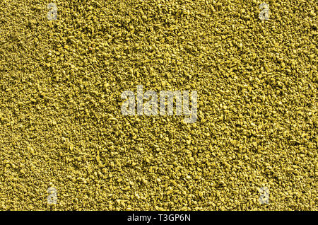Fine grained gravel, yellow Stock Photo - Alamy