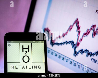 In this photo illustration a H2O Retailing Corporation logo seen displayed on a smart phone ...