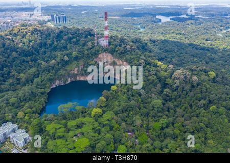 Aerial view of Bukit Timah Nature Reserve, the water body is Hindhede ...