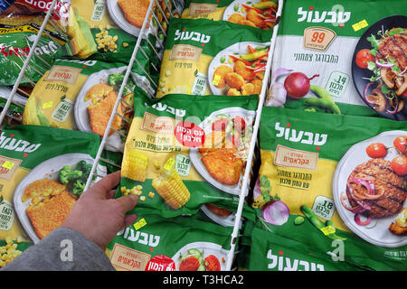 Freezer filled with packaged frozen food in a Kaufland supermarket ...