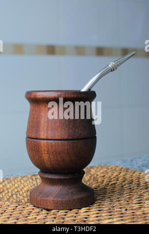 Traditional Argentinian yerba mate tea in a calabash gourd with ...