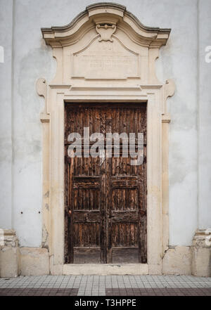 Peeling wooden door of an ancient Italian church Stock Photo - Alamy