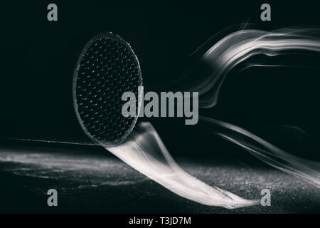 Smoke flowing out of a pipe Stock Photo - Alamy