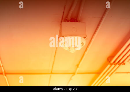 fire detector at ceiling, smoke and flame alarm sensor in commercial ...