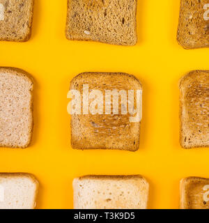 Different types of toast bread and various toasts in a toaster on a ...