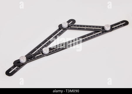 Black multi function Ruler isolated on white background. Ultimate ...