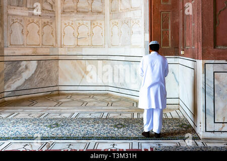 Religious muslim man praying inside the mosque Stock Photo - Alamy