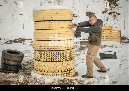 Combat gun shooting training from behind and around cover or barricade ...