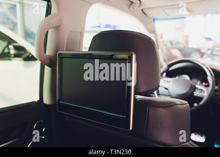 Car inside headrest screen mock up. Interior of prestige luxury modern ...