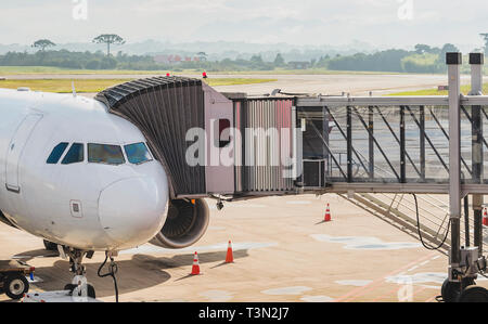 Airplane connected to gate bridge. Aircraft ready for boarding Stock ...