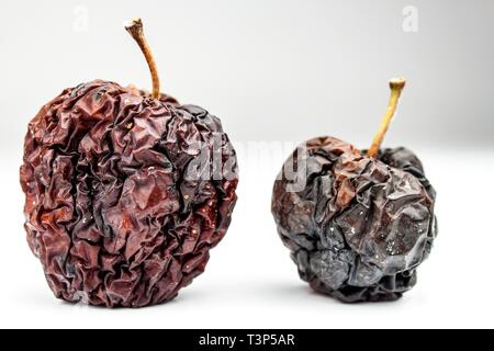 Shriveled apple. Old apple. Wrinkled apple texture. Dry skin. Old ...