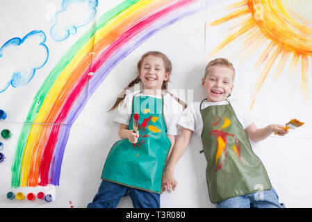 kids painting rainbow Stock Photo - Alamy