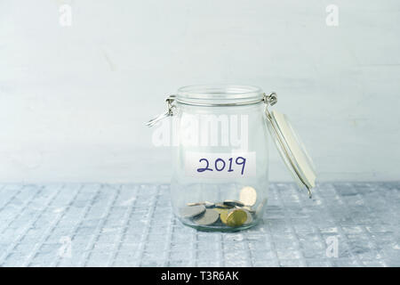 Empty glass money jar with 2019 label, financial concept Stock Photo ...