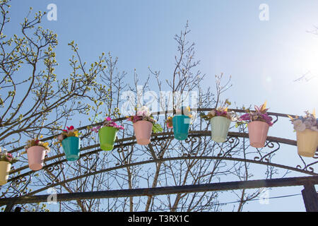 Fake flowers in flower pots for decoration Stock Photo - Alamy