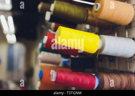 Image of a lot of coils with multi-colored threads Stock Photo - Alamy