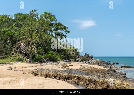 a Closeup of rocks under blue water Stock Photo - Alamy