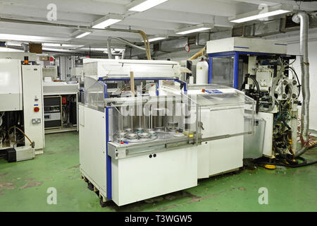 DVD and CD Manufacturing Machines in Factory Stock Photo - Alamy