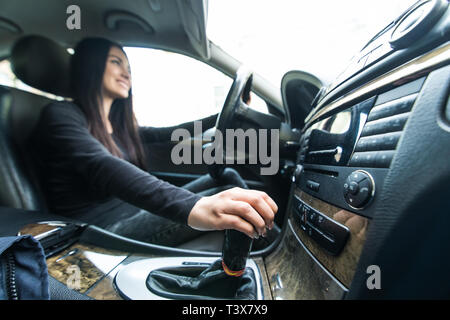 Female driver hand shifting gear manually. Girl driving a car Stock ...