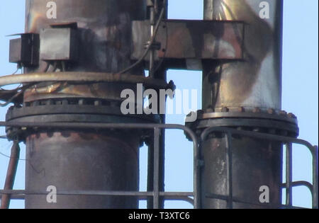 Flange connections on gas flaring. Burning through a torch head Stock ...