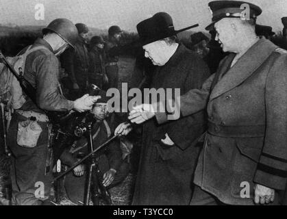 Winston Churchill and General Eisenhower inspect troops prior to the ...