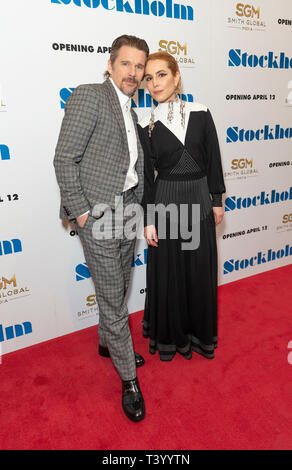 Ethan Hawke and Noomi Rapace wearing dress & earings by Givenchy attend ...