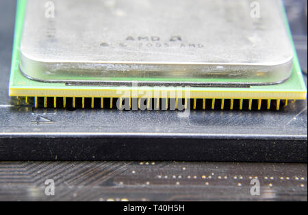 Computer processor, contact feet. Electronic board with electrical ...