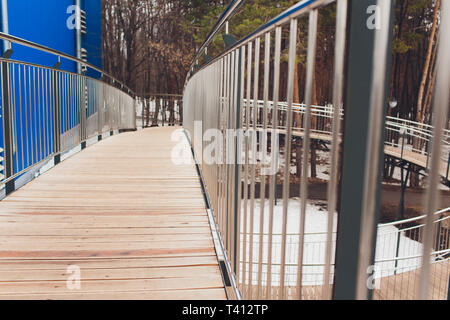 Concret ramp way with stainless steel handrail with disabled sign for ...