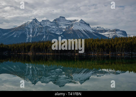 Mount Saint Piran, Mount Niblock and Divide Mountain over Herbert Lake ...