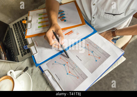 Hand of accountant checking financial document. panoramic banner Stock ...