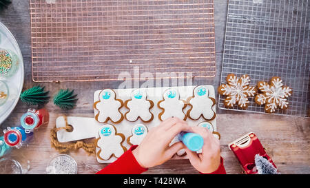 Flat lay. Step by step. Decorating gingerbread and sugar cookies with ...