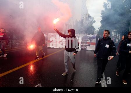 Protesters clash with riot police as they participate in a ...