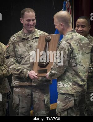 The 12th Combat Aviation Brigade commander, Col. Kenneth Cole, presents ...