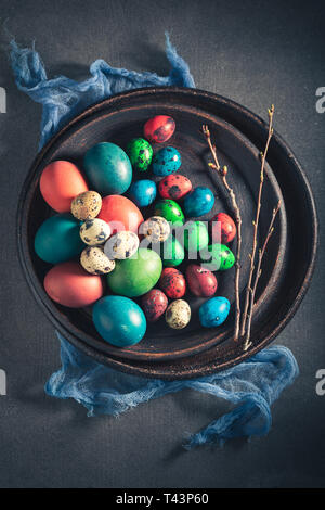 Quail feather and eggs top view Stock Photo - Alamy
