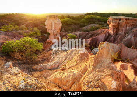Marafa Depression (Hell's Kitchen canyon) with red cliffs and rocks in ...