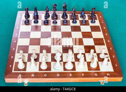 Chess pieces on a chessboard side view, selective focus Stock Photo - Alamy