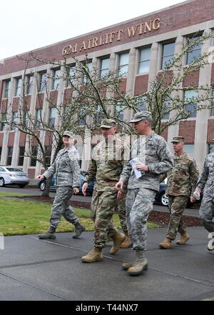 Col. Erin Staine-Pyne, 62nd Airlift Wing commander, speaks for the ...