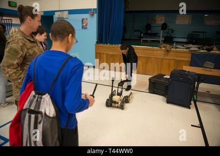 A remote-controlled Micro Tactical Ground Robot can use a camera to ...