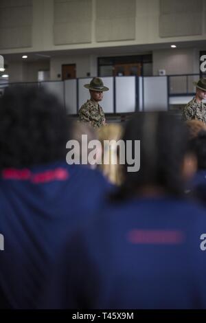Members of the Marine Corps’ Delayed Entry Program run a three-mile ...