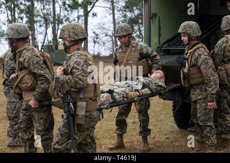 U.S. Marines with the Damage Assessment Team assigned to Marine Wing ...