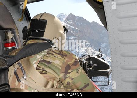 Spc. Andrew Southard, an Army black hawk crew chief with Task Force ...