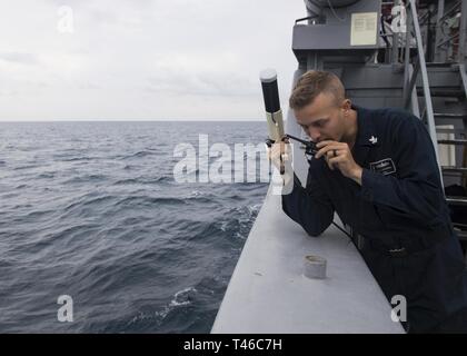 PHILIPPINE SEA (March 11, 2019) Navigation officer, Lt. Jordan Yuson ...