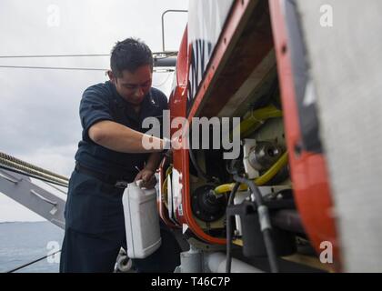 PHILIPPINE SEA (March 11, 2019) Navigation officer, Lt. Jordan Yuson ...