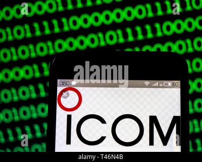 In this photo illustration an Icom Incorporated logo seen displayed on ...