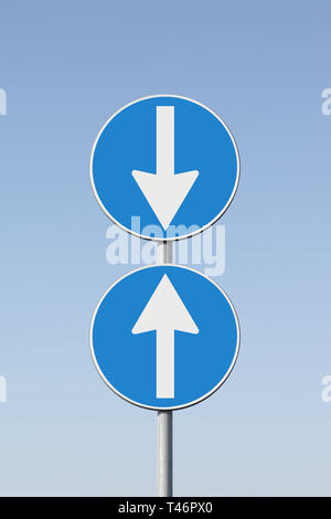 Contradiction concept with road signs - concept image Stock Photo - Alamy