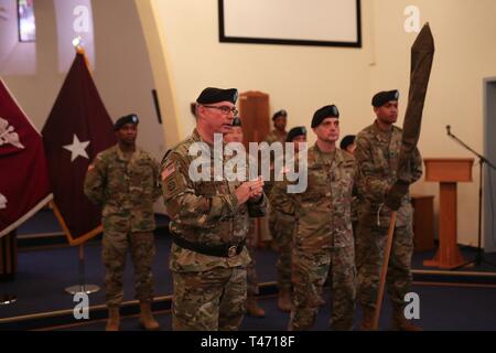 Maj. Gen. Joseph A. Marsiglia smiles as he receives the colors during a ...